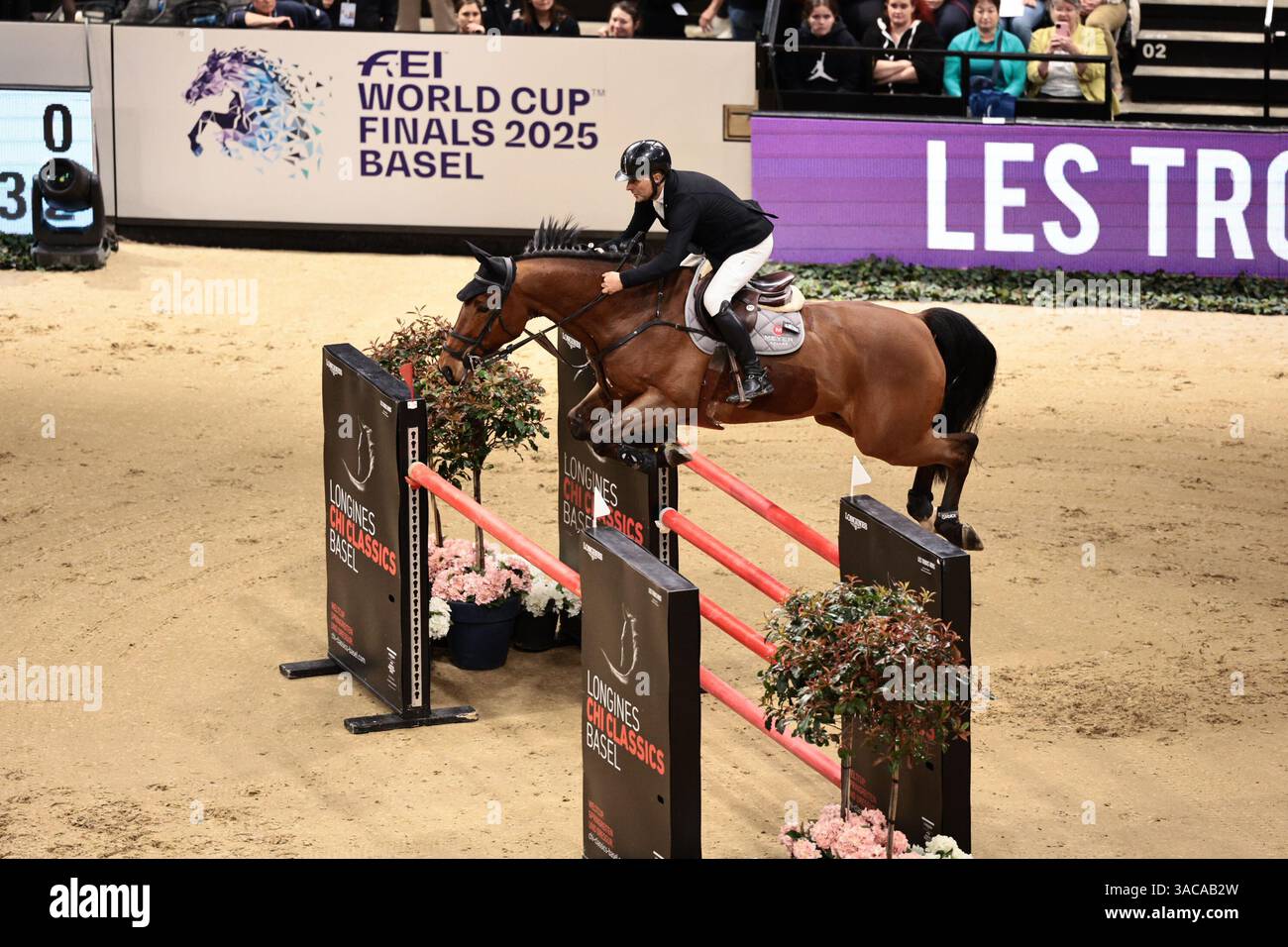 Niklaus Rutschi of Switzerland with Kingstone B during the Prize of ...