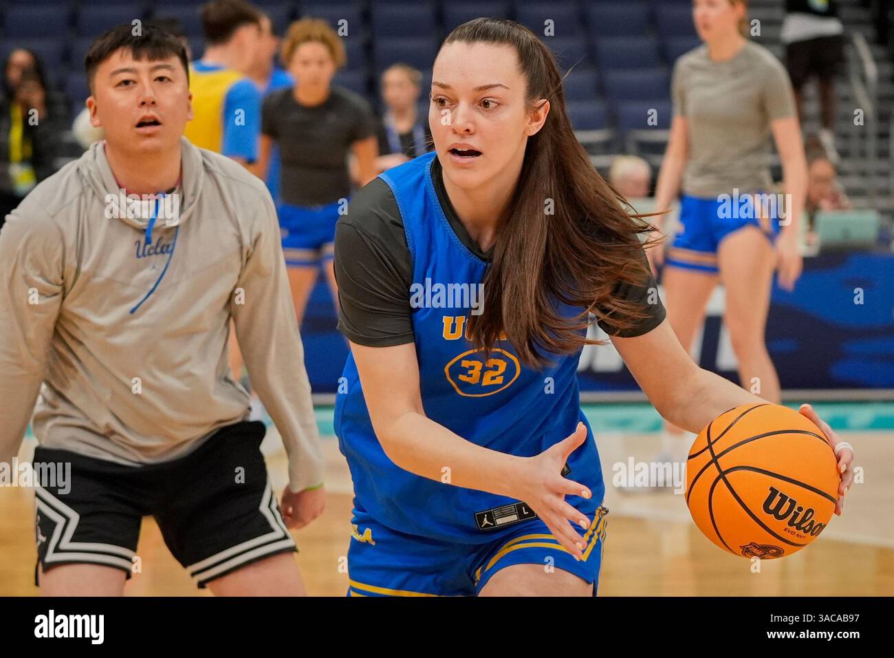 UCLA forward Angela Dugalic (32) goes through a drill during practice ...