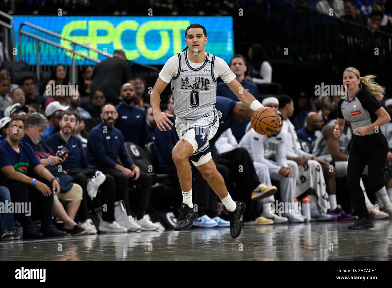 Orlando Magic guard Anthony Black (0) brings the ball up the court ...