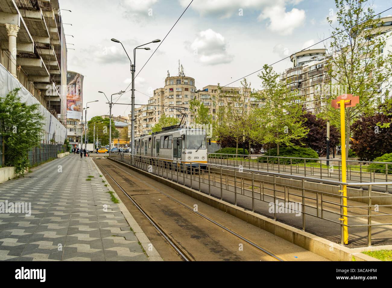 Tram in traffic. Public transport Bucharest, Romania Stock Photo - Alamy
