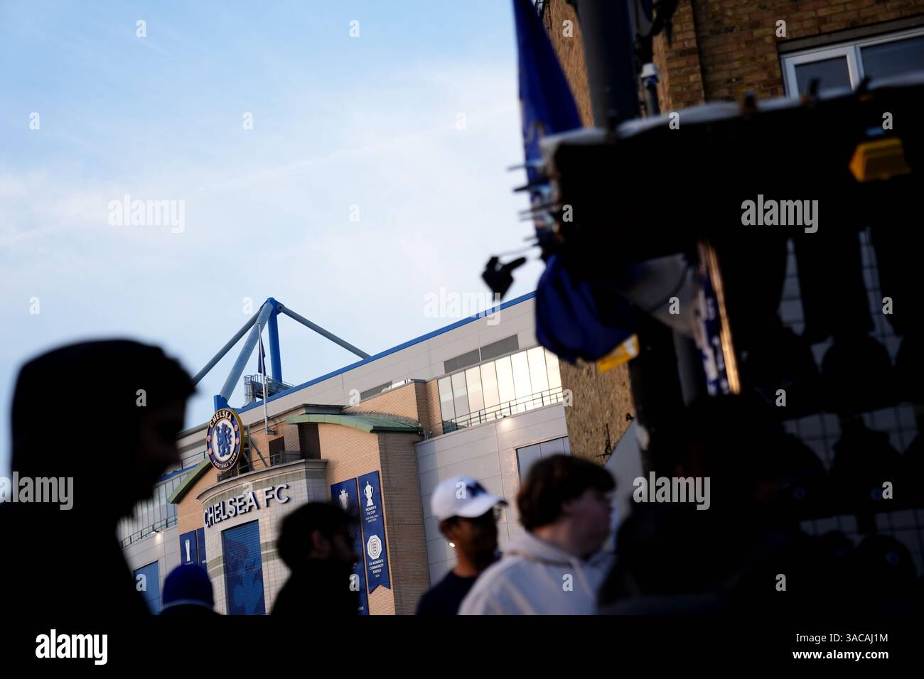 Fans outside the ground before the Premier League match at Stamford ...