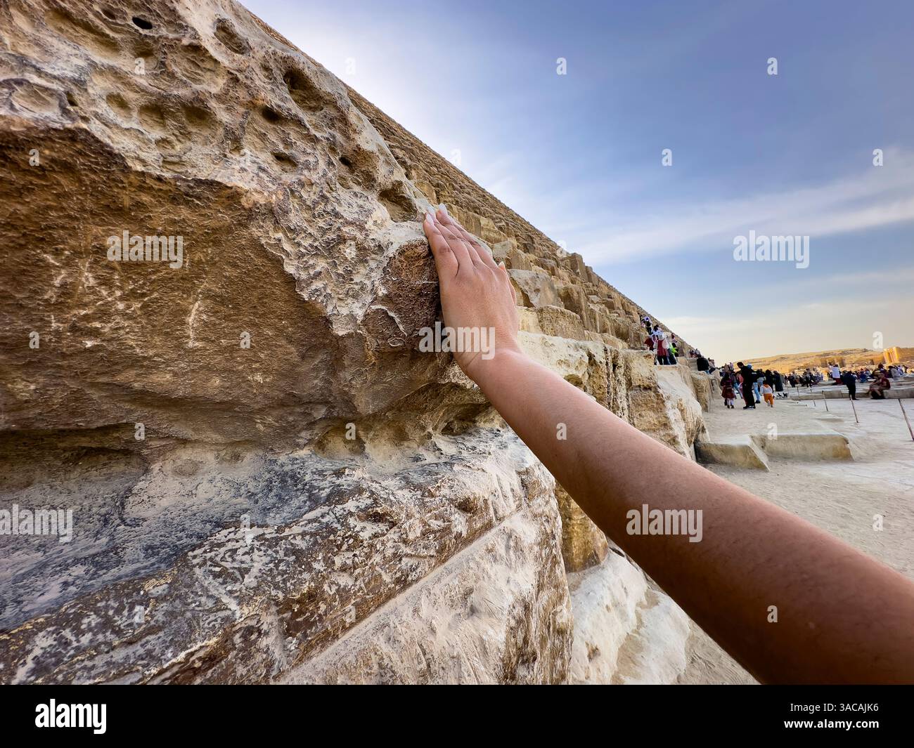 Feel Giza's majestic touch as a tourist's hand explores the Great ...