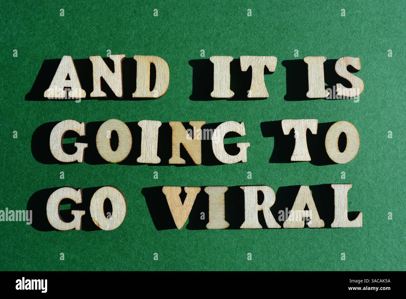 And it is going to go viral, phrase in wooden alphabet letters isolated ...