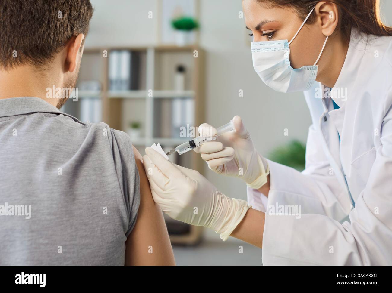 Nurse injection, syringe for vaccination, adult immunization shot ...