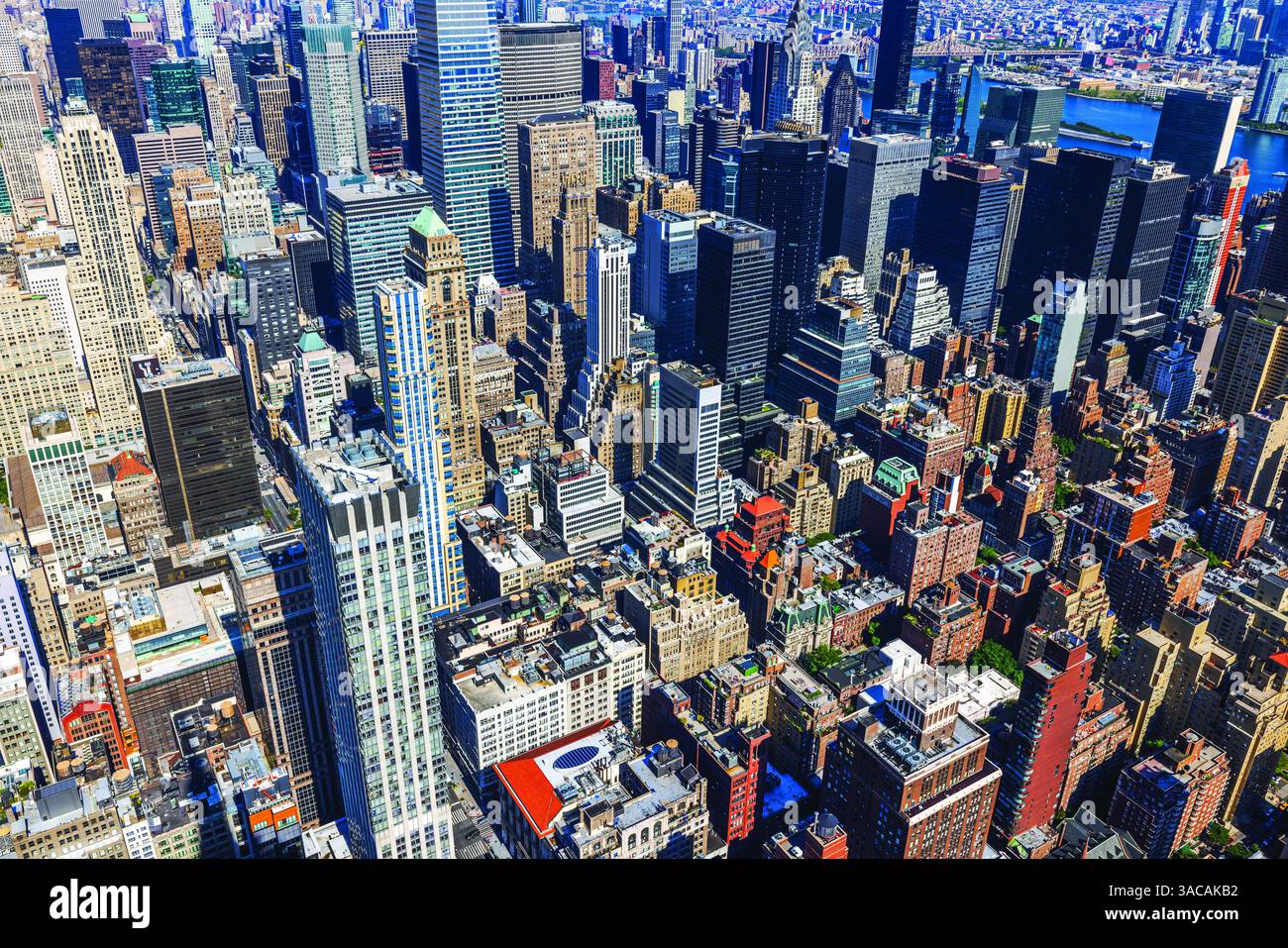 Aerial view of Midtown Manhattan with tall skyscrapers and dense urban ...