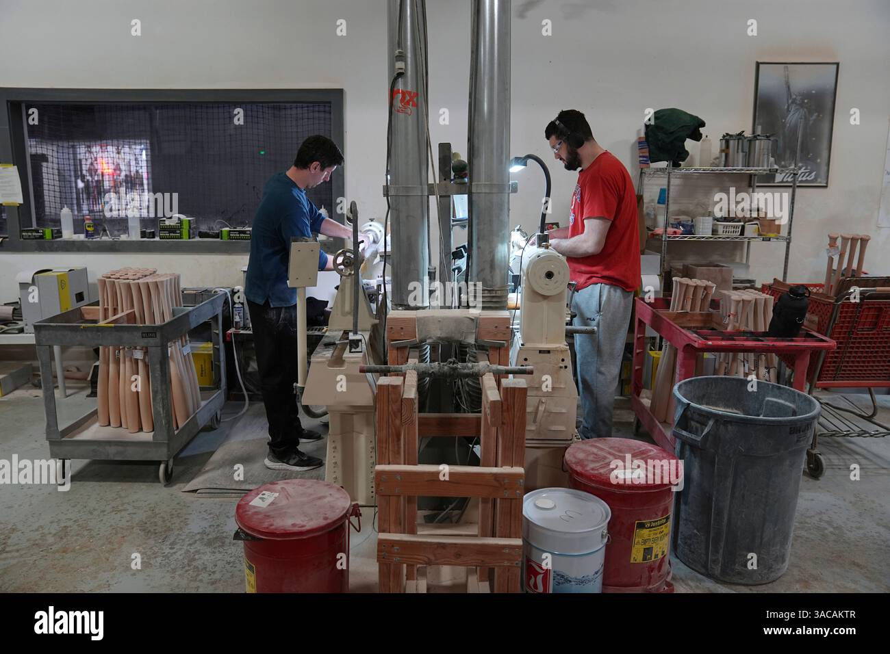 Jim Levasseur, left, and Joseph D'Emilio manufacture torpedo baseball ...