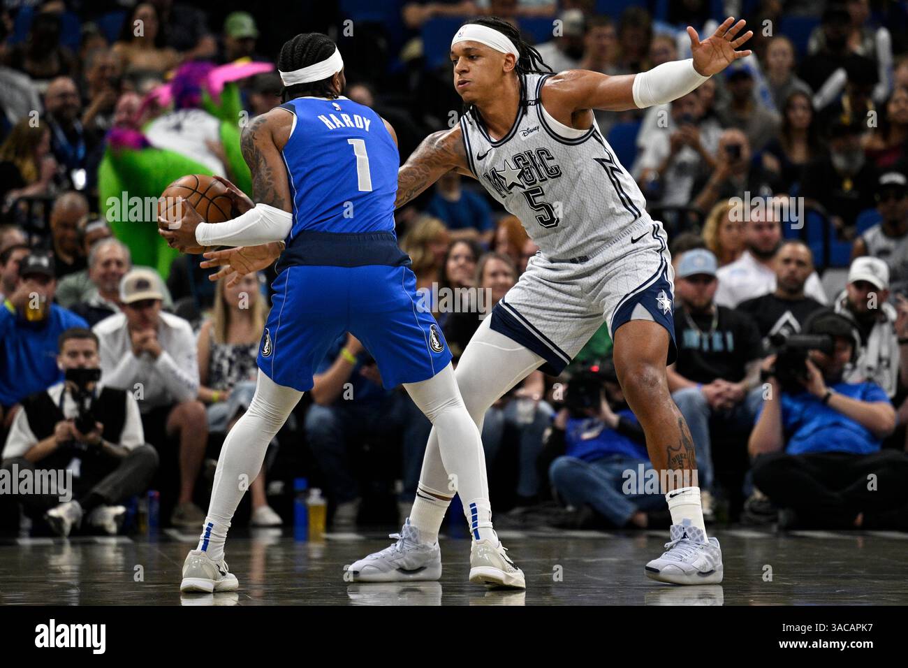 Dallas Mavericks guard Jaden Hardy (1) is defended by Orlando Magic ...
