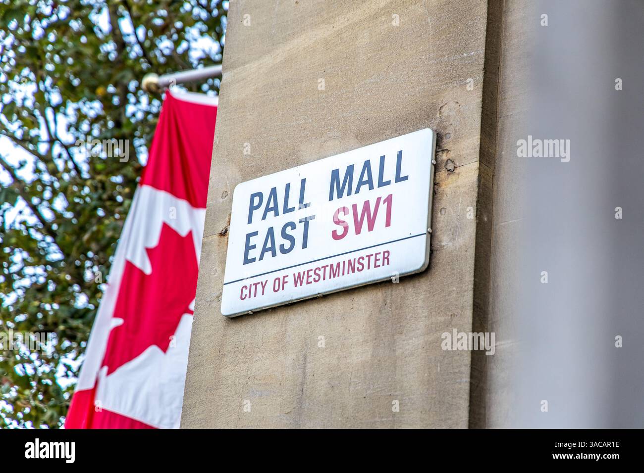 London, UK - September 14, 2023: Pall Mall East Street name sign on a ...