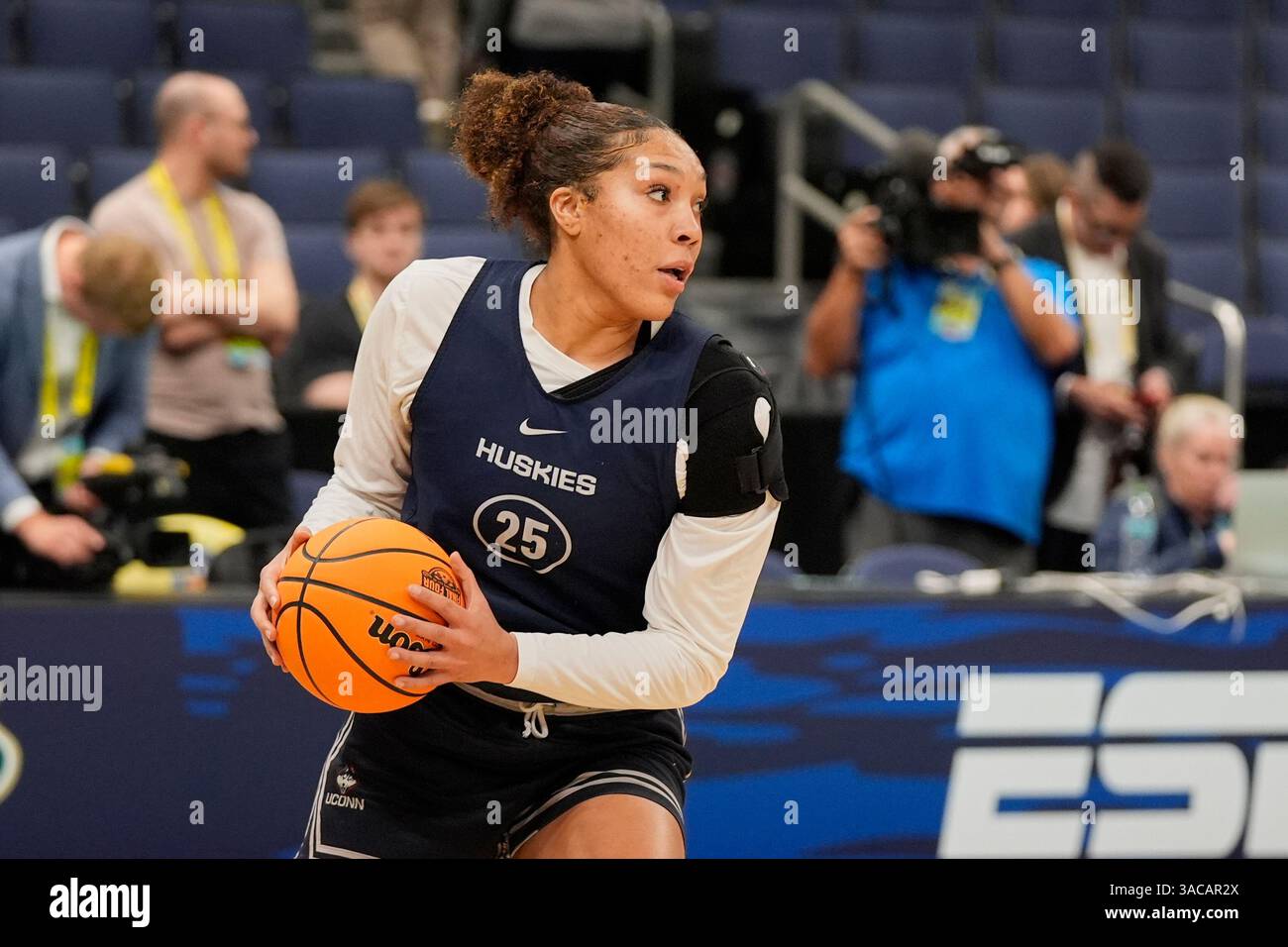 UConn forward Ice Brady (25) goes through a drill during practice at ...