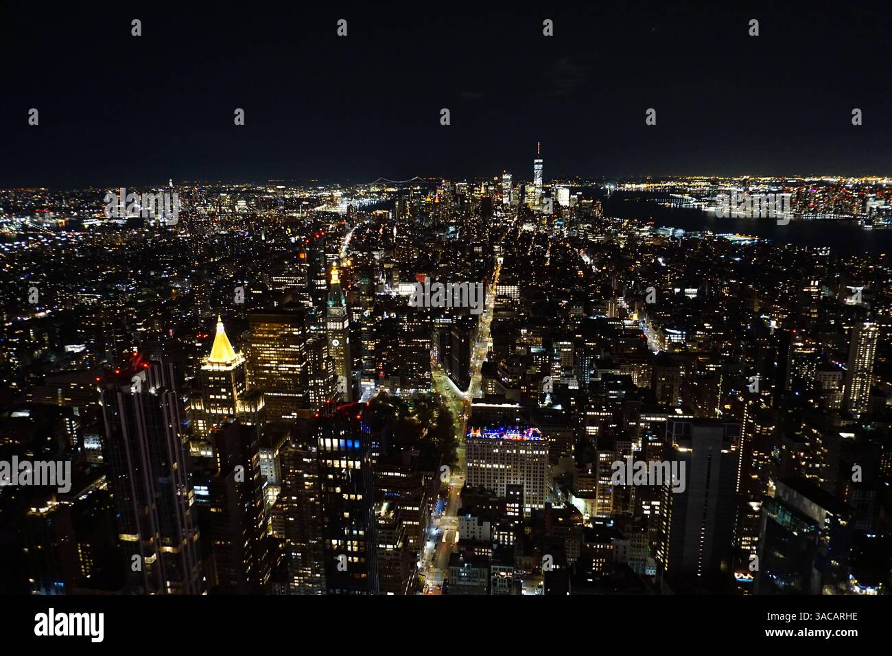 Aerial panorama of the city lights from the Manhattan skyscrapers ...