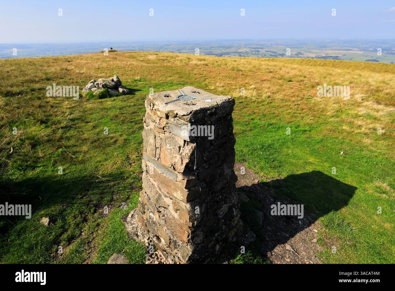 View of the summit cairn and OS Trig point, of Fellbarrow fell above ...
