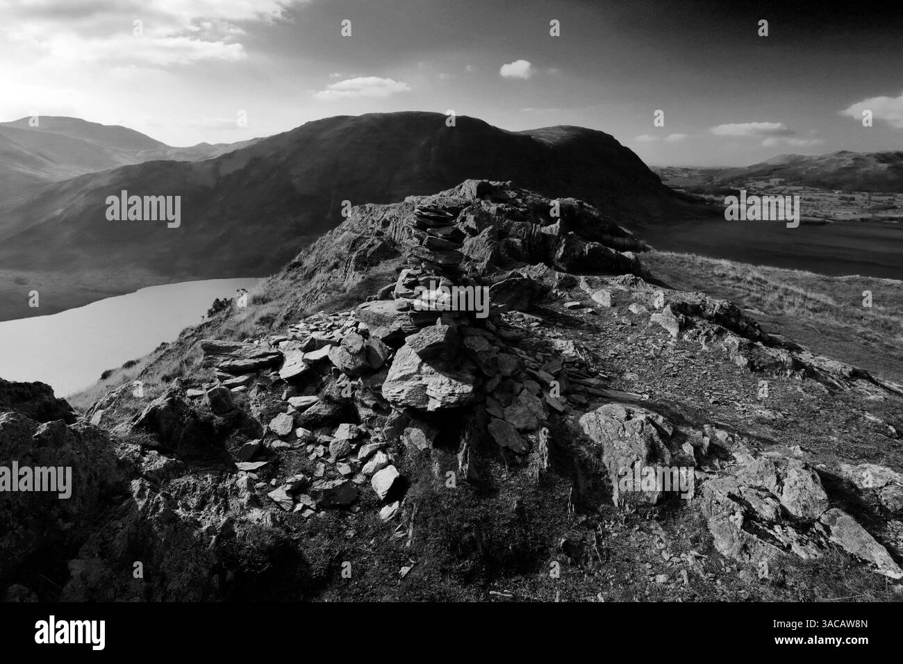 View of the summit cairn of Rannerdale Knotts fell above Crummock Water ...