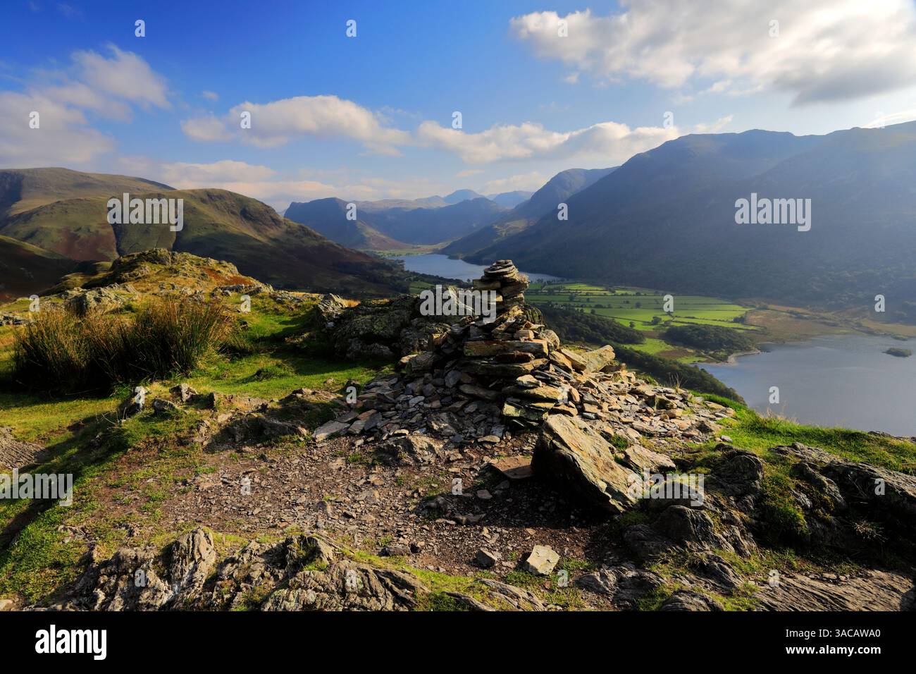 View of the summit cairn of Rannerdale Knotts fell above Crummock Water ...