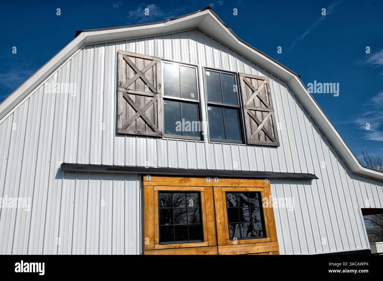 Rural countryside with modern new white farmhouse house home barn ...