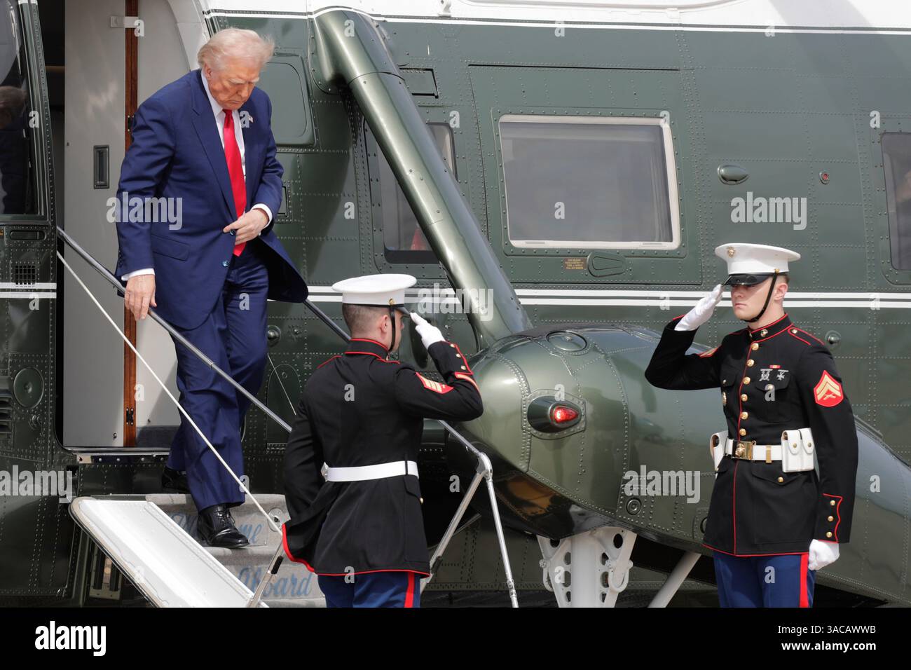 President Donald Trump steps off Marine One at Joint Base Andrews, Md ...