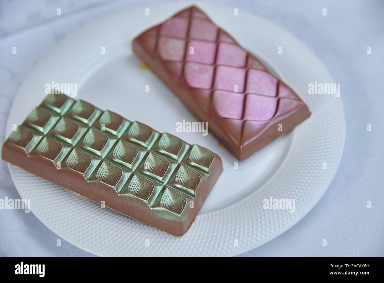 Dubai chocolate. Lush chocolate delicacies, gleaming with ethereal ...