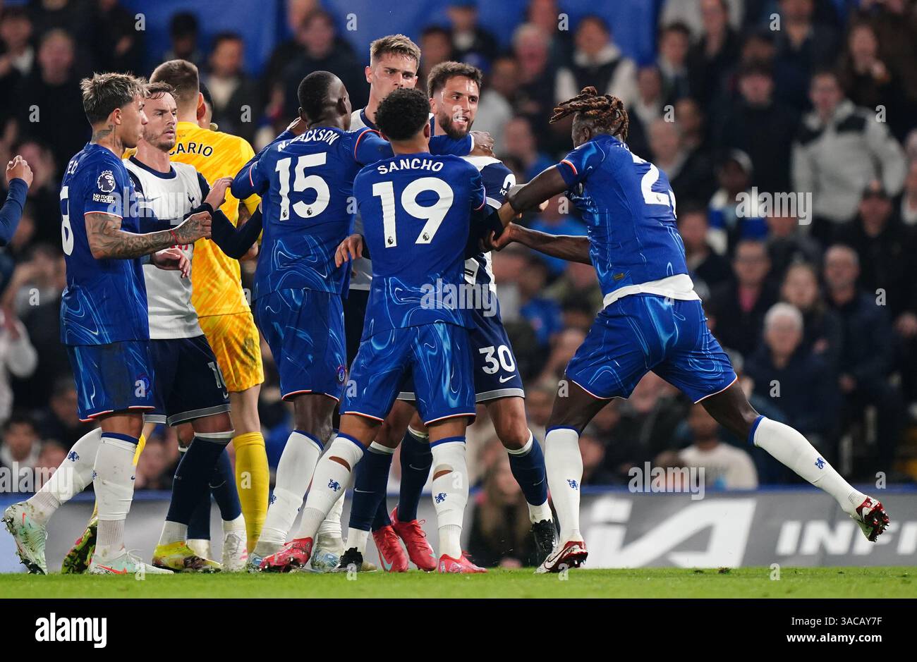 Chelsea's Trevoh Chalobah (right) reacts to Tottenham Hotspur's Rodrigo Bentancur after Chelsea ...
