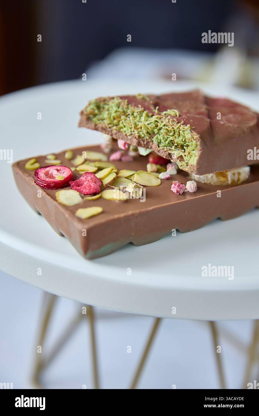 Dubai chocolate. Delicious fractured chocolate bar, speckled with ...