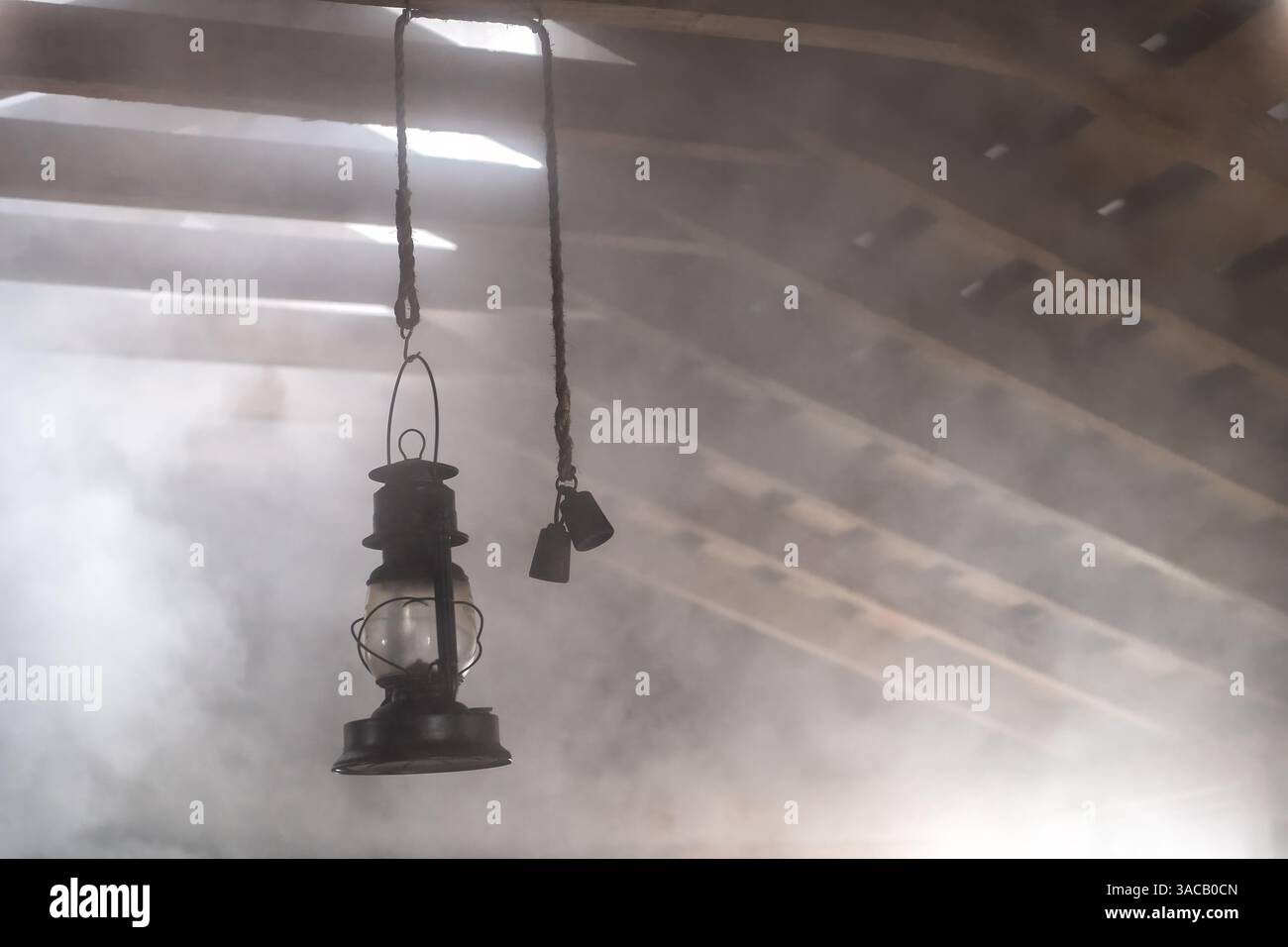 Shed barn ceiling with water vapor steam rising at traditional maple ...