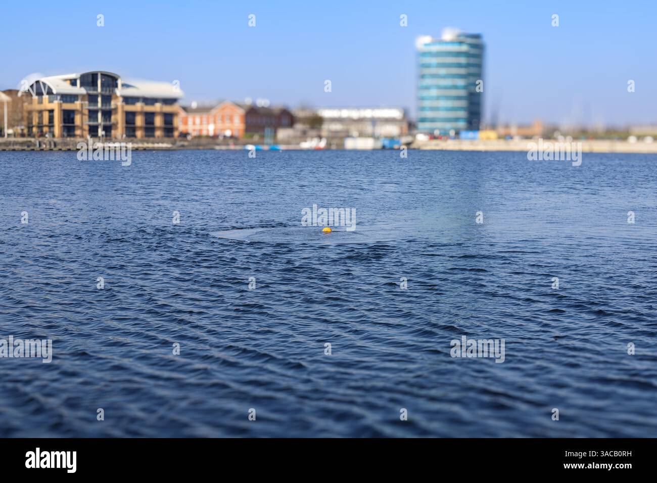 Modern waterside properties and apartments surrounding marina at ...