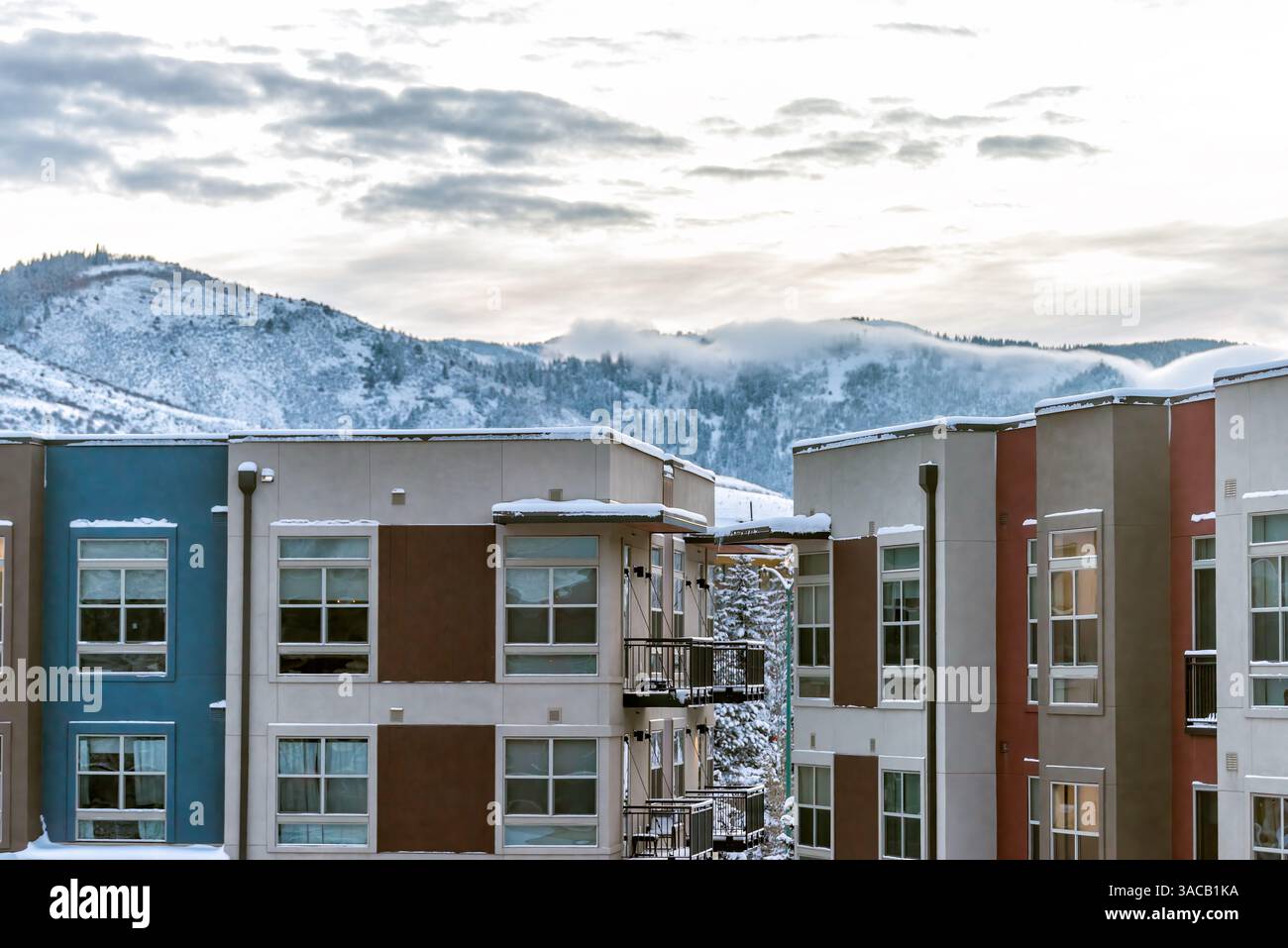 Avon, Colorado town in winter snow clouds mist blanketing view of Rocky ...