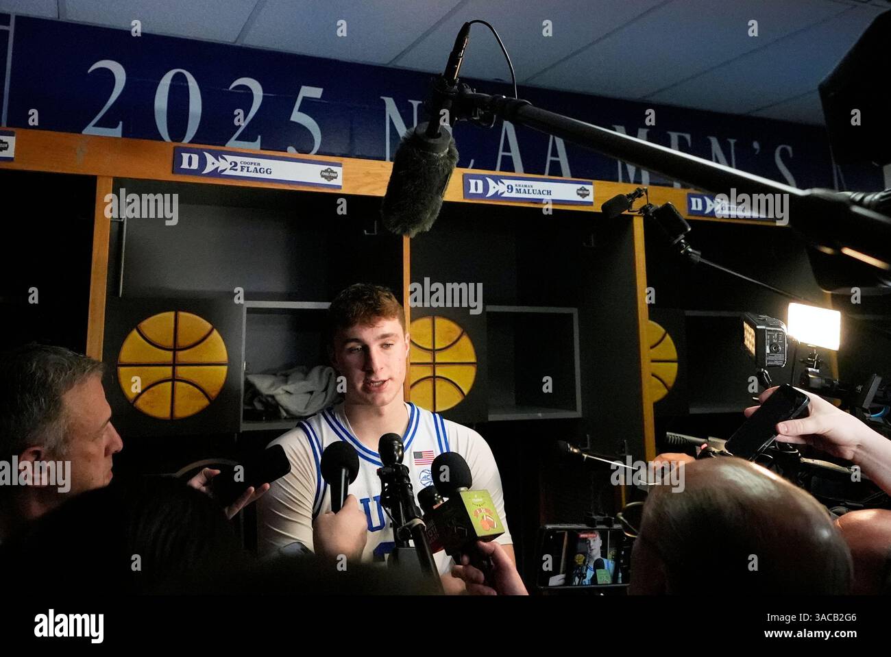 Duke forward Cooper Flagg is interviewed in the locker room during ...