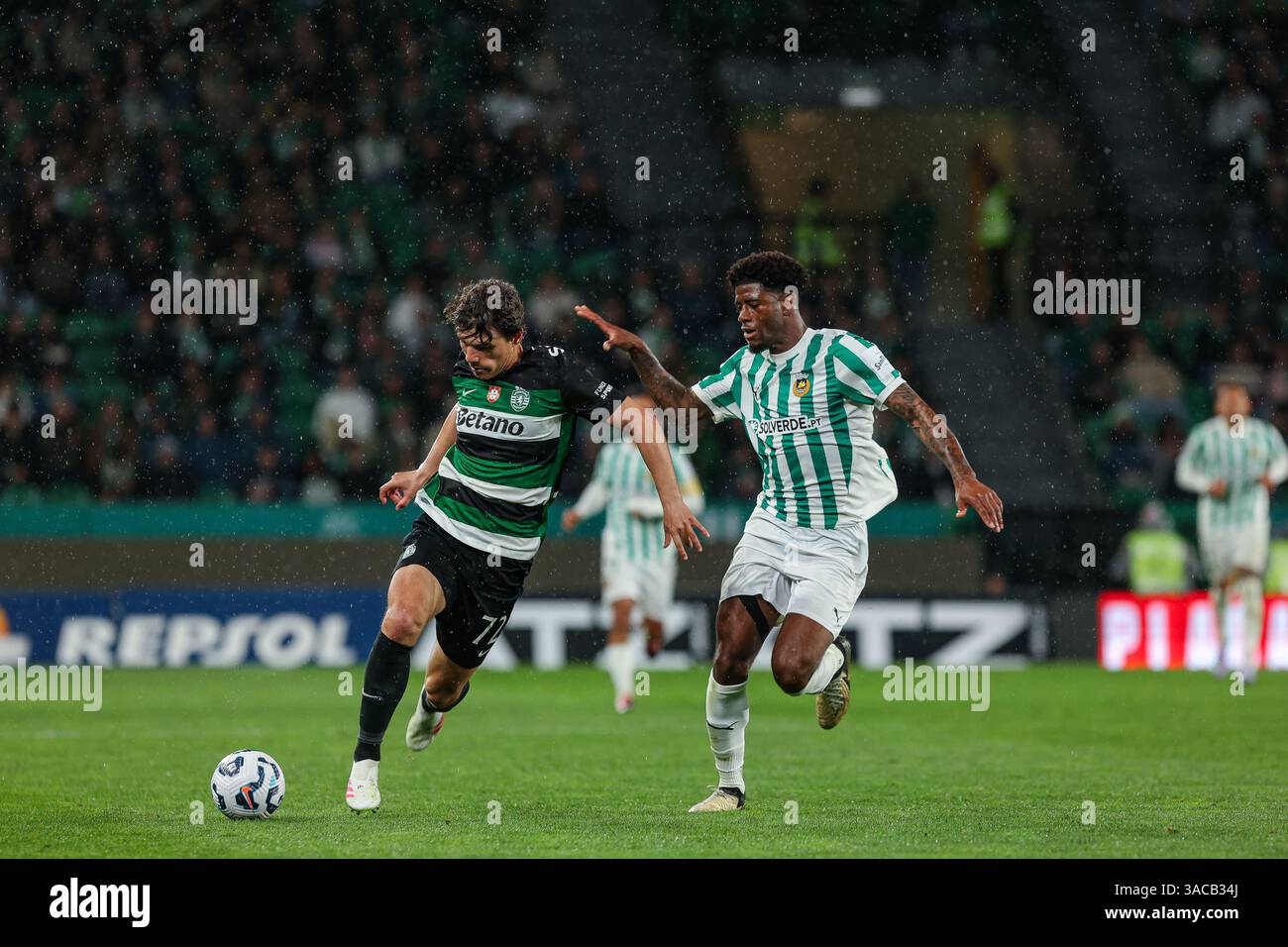 Eduardo Quaresma defender of Sporting CP battle with Jonathan Panzo ...