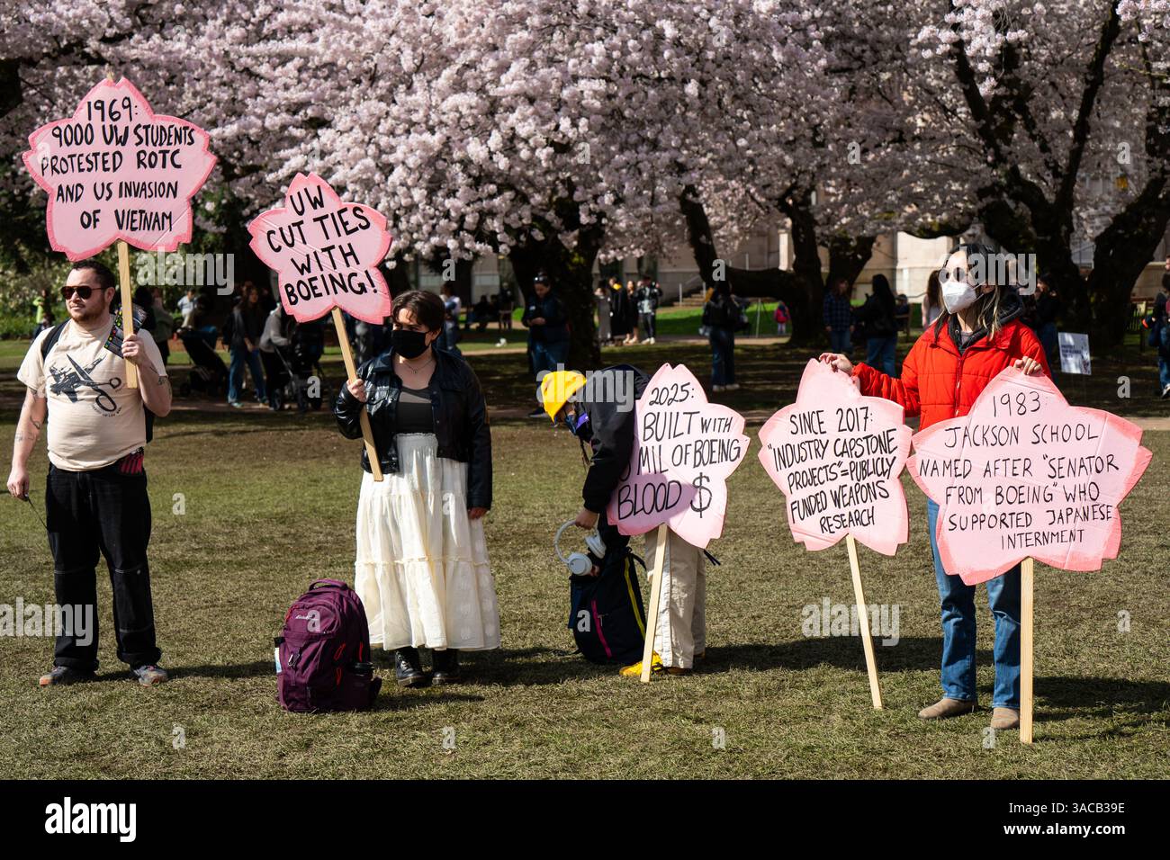Seattle, USA. 3rd Apr 2025. Amongs the Cherry Blossoms a protest ...