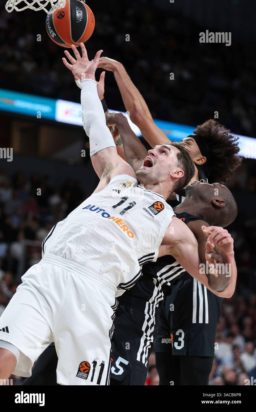Mario Hezonja of Real Madrid, Bandja Sy and Tyson Ward of Paris ...