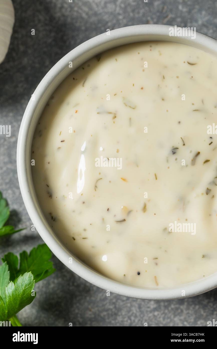 Homemade Ranch Salad Dressing with Garlic and Parsley Stock Photo - Alamy