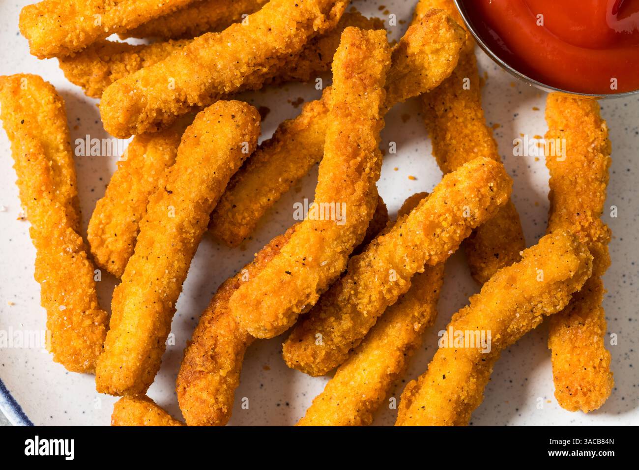 Homemade Crispy Chicken Fries with Red Ketchup Stock Photo - Alamy