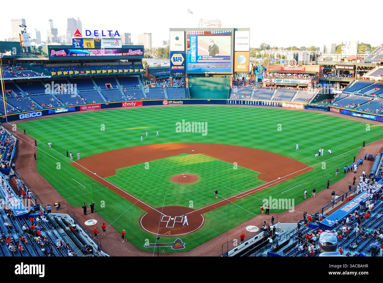 The grounds crew at Turner Field completes there pre game preparation ...