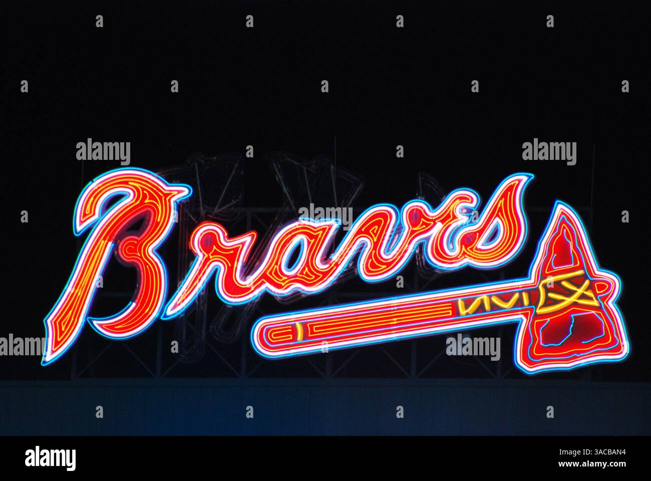 A large neon sign depicting the name and logo of the Atlanta Braves ...