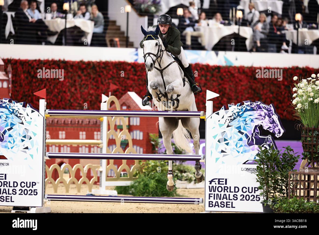 Daniel Coyle of Ireland with Incredible during the LONGINES FEI Jumping ...