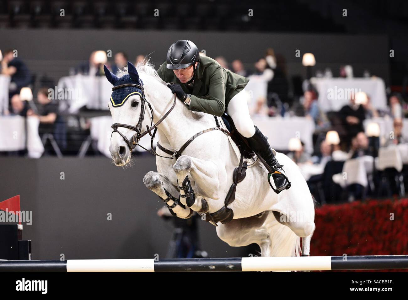 Daniel Coyle of Ireland with Incredible during the LONGINES FEI Jumping ...