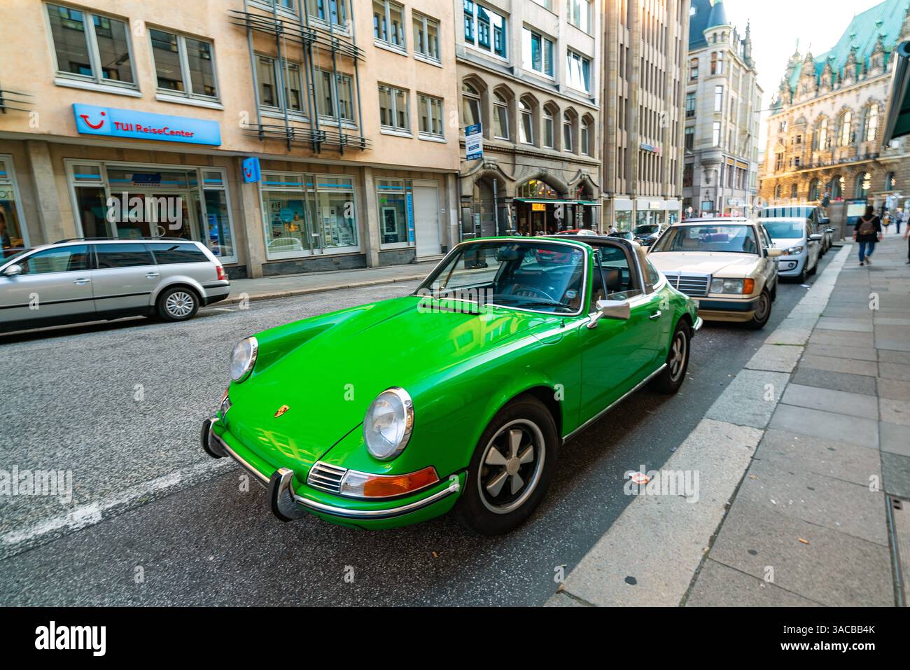 Vibrant Green Porsche 911 in Hamburg Street Scene Stock Photo - Alamy