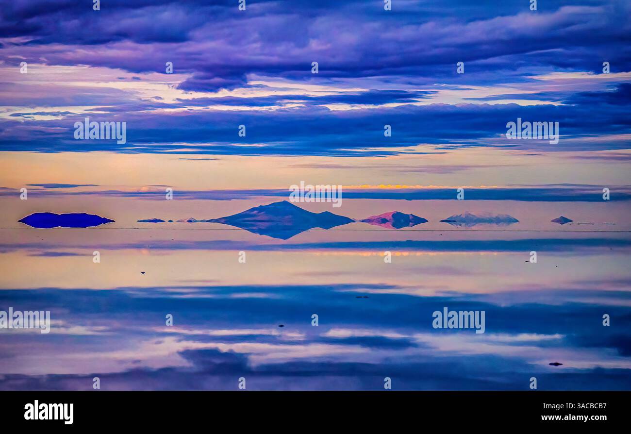 Salar de Uyuni, Bolivia. Wide angle landscape view at sunset of clouds ...
