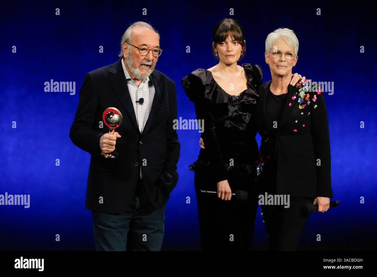 James L. Brooks, from left, accepts the CinemaCon Cinema Verite award ...