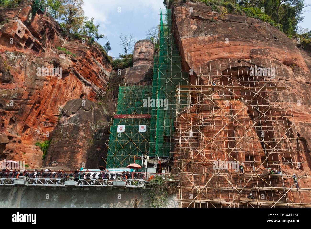 LESHAN, CHINA - APRIL 3, 2025 - Tourists visit the renovating Leshan ...