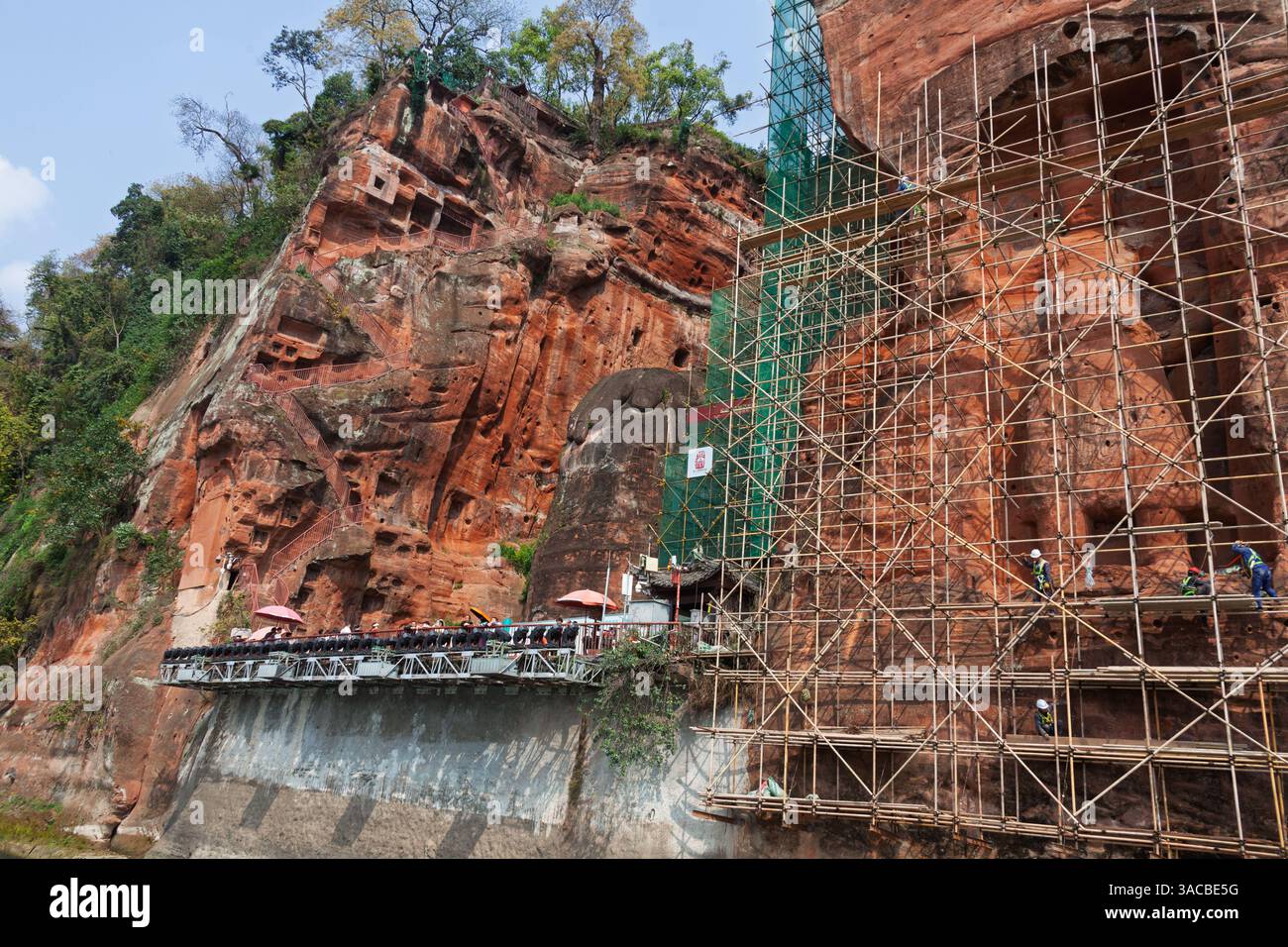 LESHAN, CHINA - APRIL 3, 2025 - Tourists visit the renovating Leshan ...
