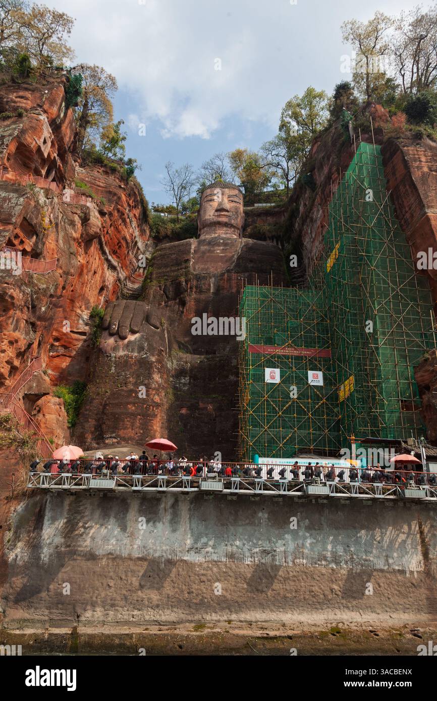 LESHAN, CHINA - APRIL 3, 2025 - Tourists visit the renovating Leshan ...
