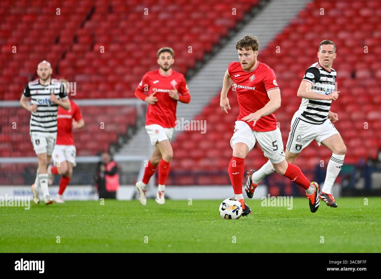 Glasgow, Scotland, UK. 2nd April, 2025. Aidan Wilson of Airdrieonians ...