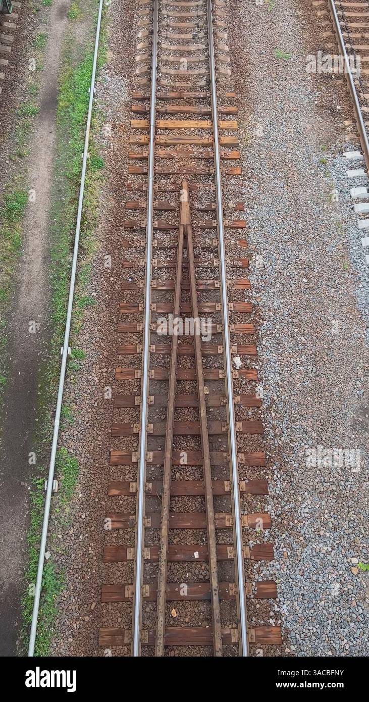 Railway Tracks Merging Into Single Line, Creating Intersection Point ...