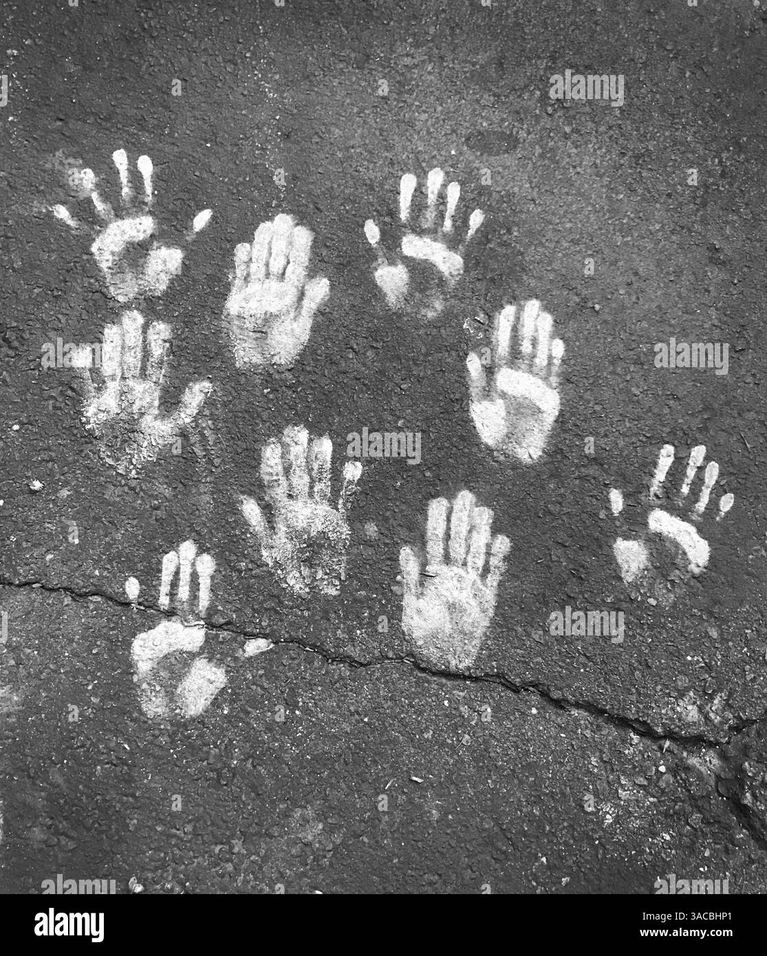 Children’s handprints on pavement showcase art and community spirit in ...