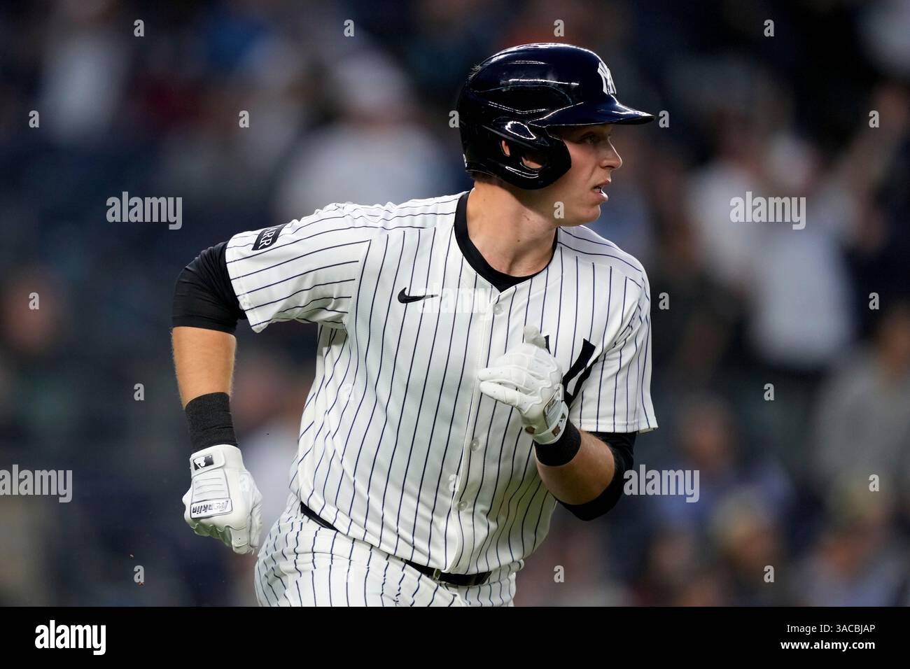 New York Yankees' Ben Rice runs to first base after hitting a ground ...