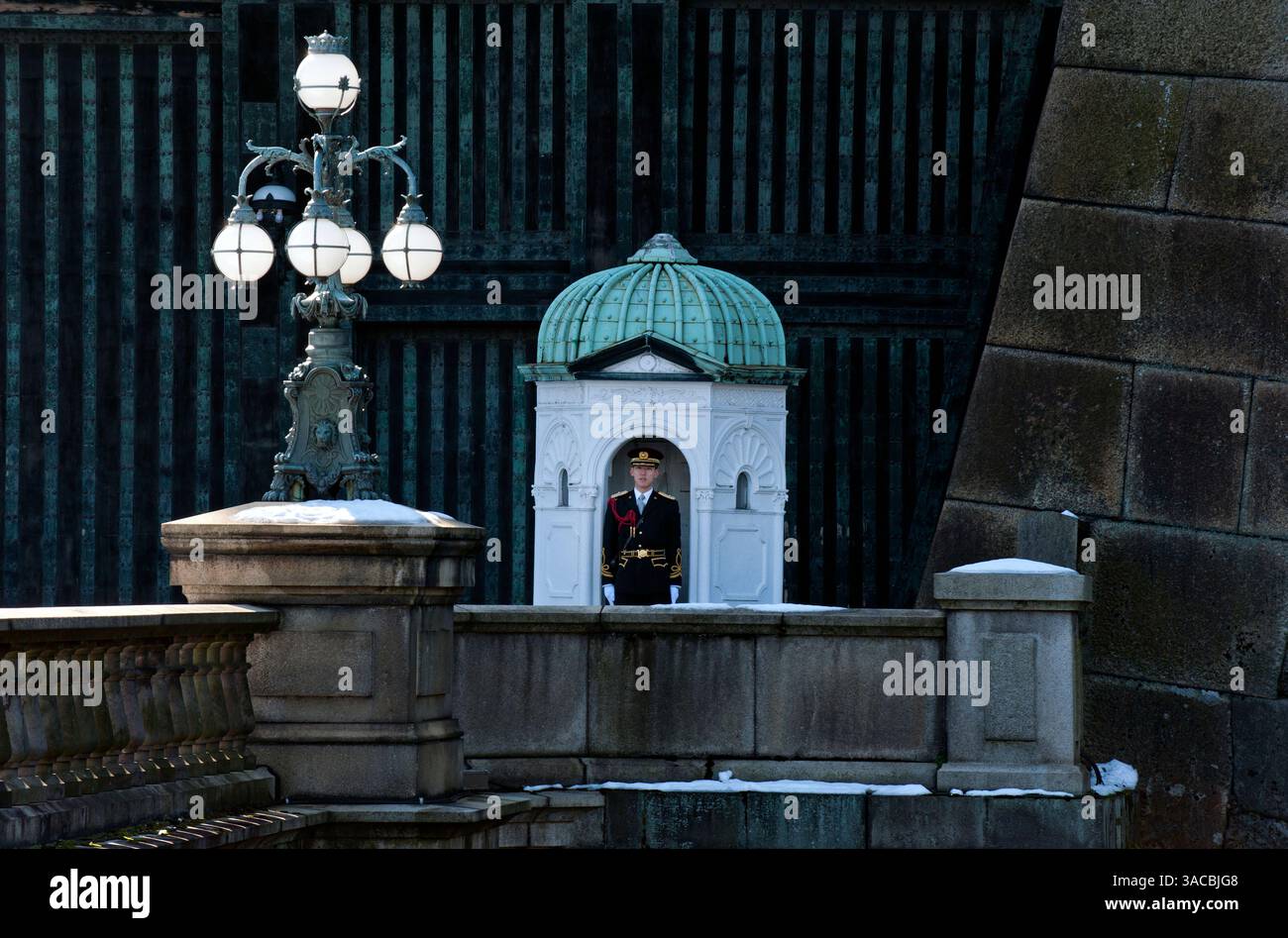 Tokyo Imperial Palace guard standing stoically in his guard hut at the ...