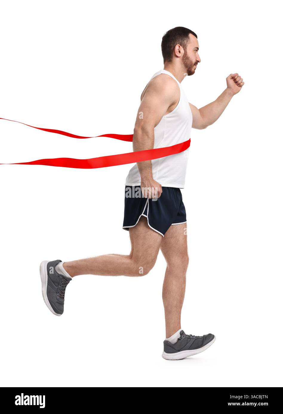 Sportsman crossing red finish line ribbon on white background Stock ...