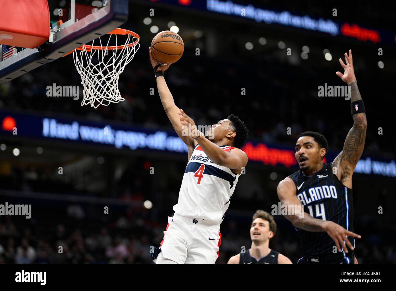Washington Wizards guard Jaylen Martin (4) goes to the basket past ...