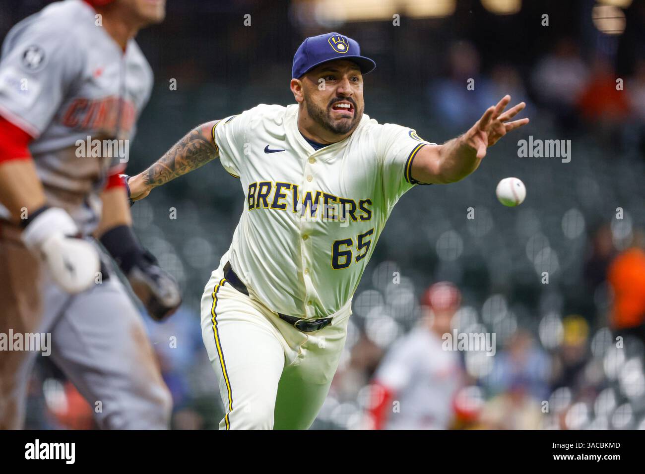 Milwaukee Brewers starting pitcher Nestor Cortes throws out Cincinnati ...