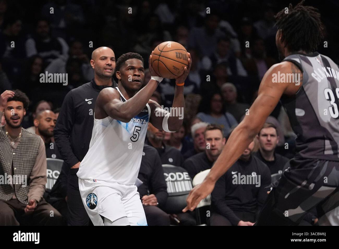 Minnesota Timberwolves' Anthony Edwards (5) shoots over Brooklyn Nets ...